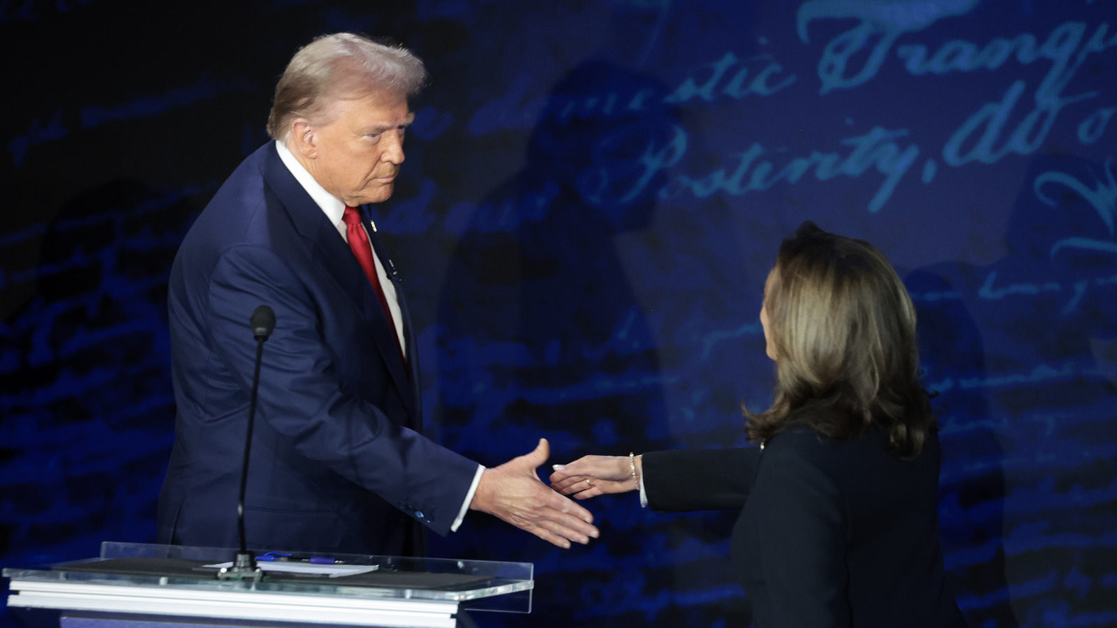 Body Language Expert Says Trump's Viral Handshake Moment With Kamala ...