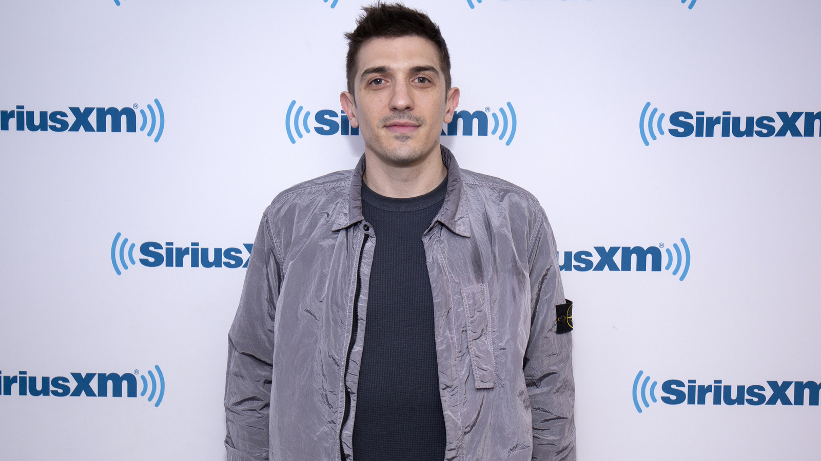Comedian Andrew Schulz Celebrated His Marriage With A Jab At Harry & Meghan