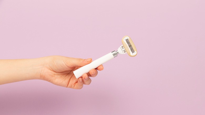 Sharing A Razor With Your Partner? Here's Why It's Not A Good Idea Sharing A Razor With Your Partner? Here's Why It's Not A Good Idea