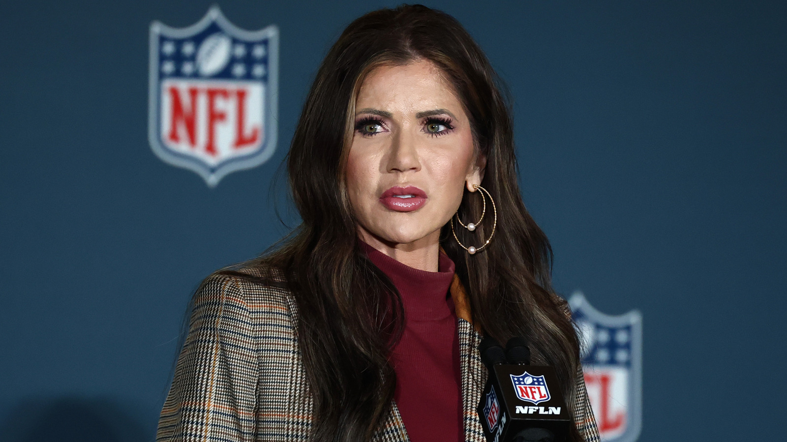 The Bold Accessory We're Hoping Kristi Noem Never Wears Again