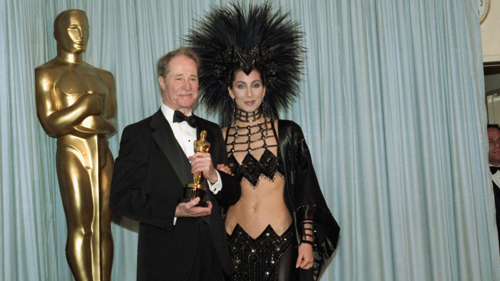 The Story Behind One Of Cher's Most Controversial Oscars Outfits Of All Time
