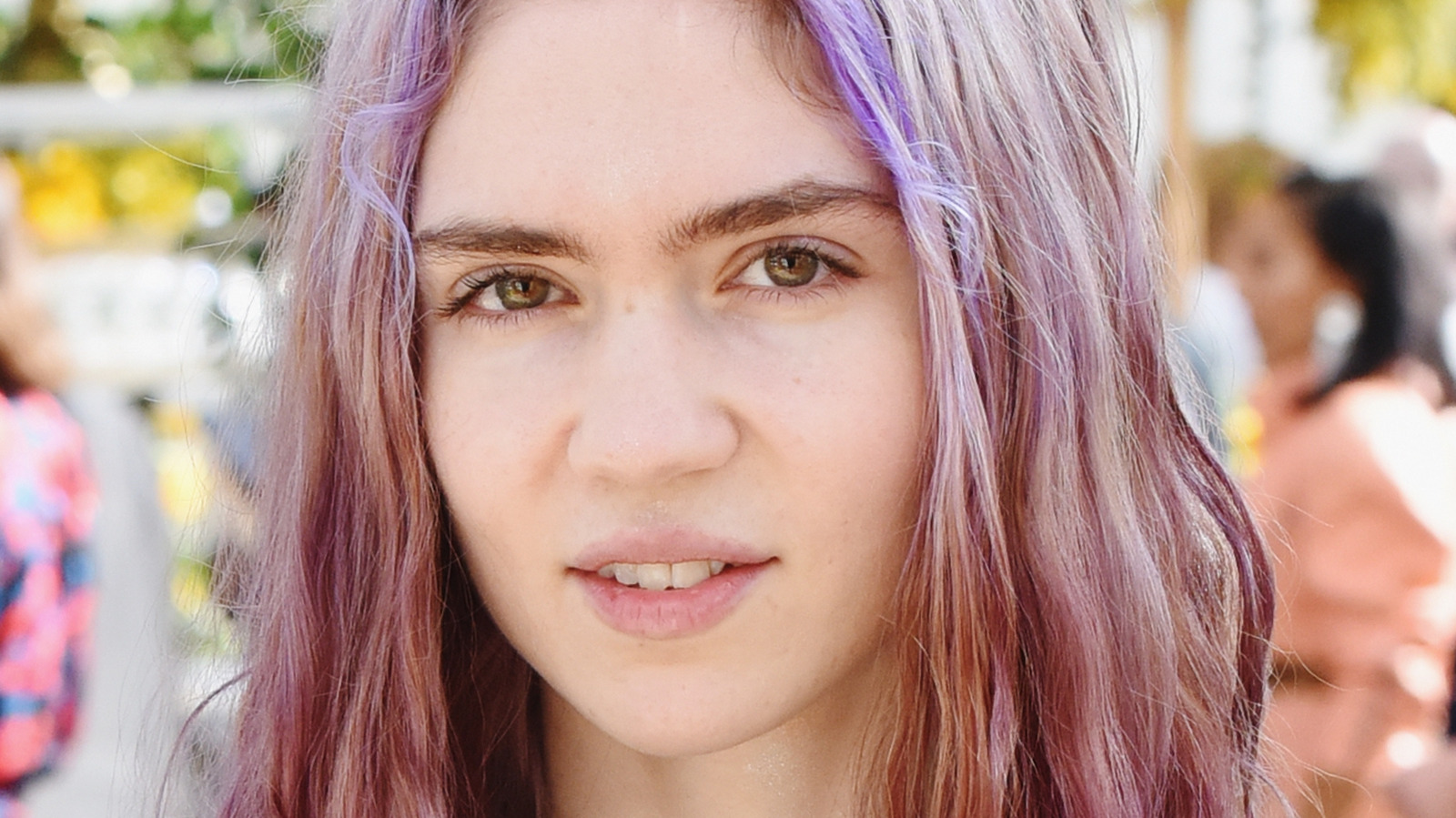 The True Meaning Behind Grimes' Intensely Revealing New Music Video