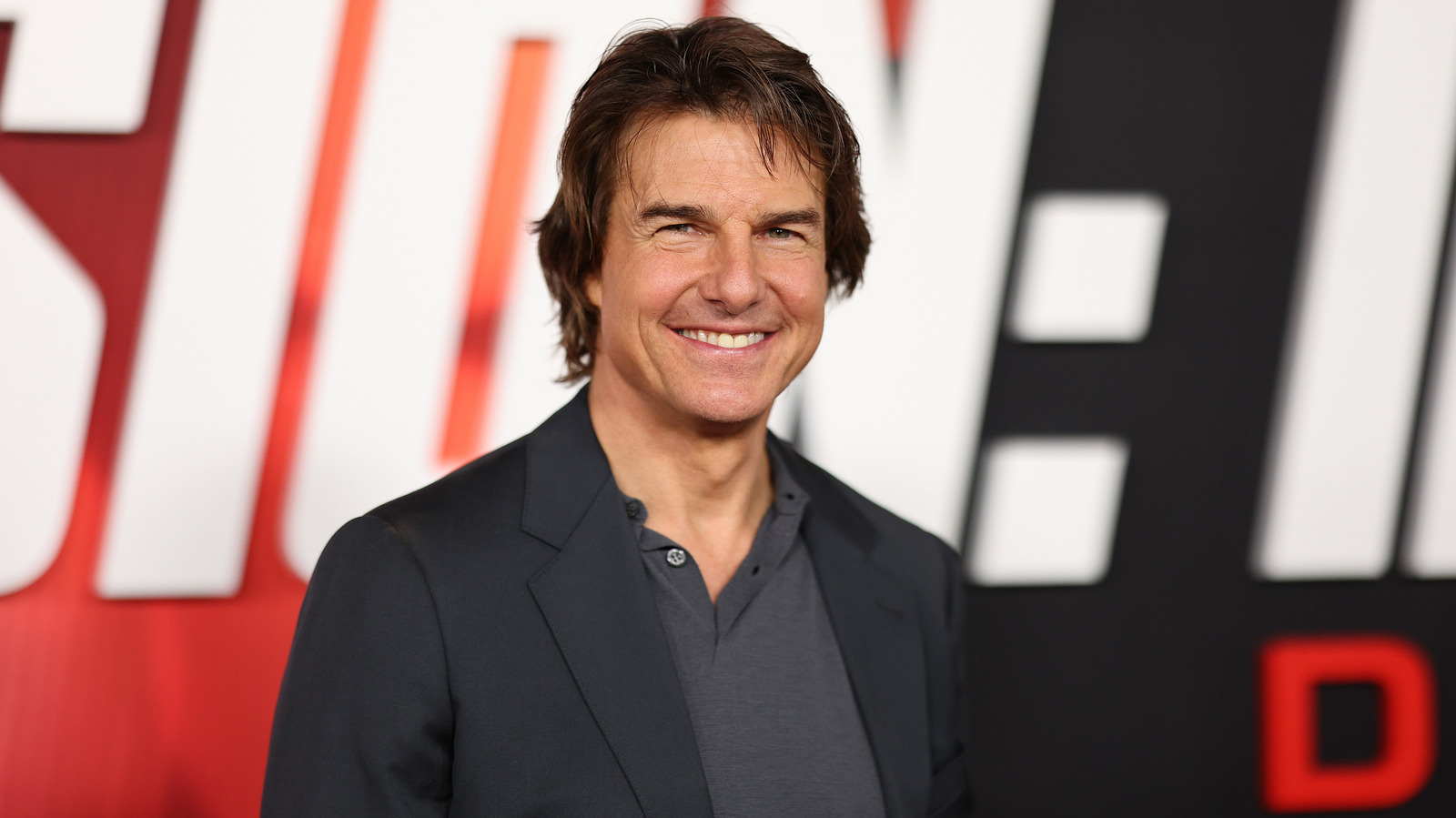Tom Cruise's Wild Hair Amid Suri Rift Is Giving Midlife Crisis In New Photo