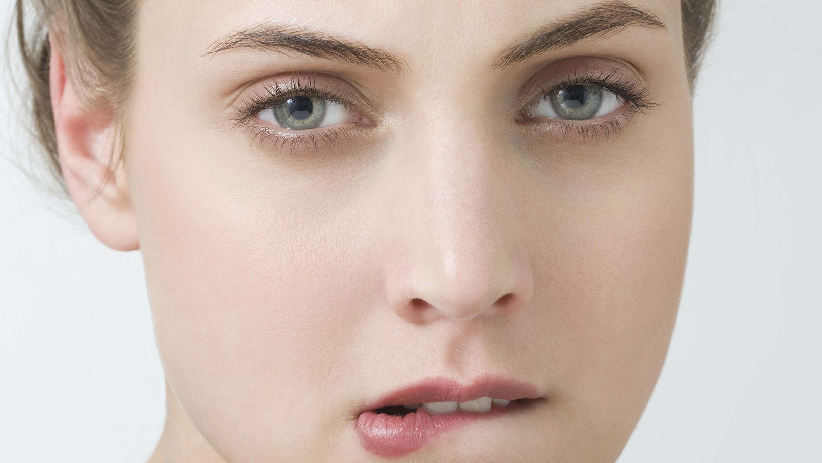 What It Really Means If You Bite Your Lips 247 News Around The World