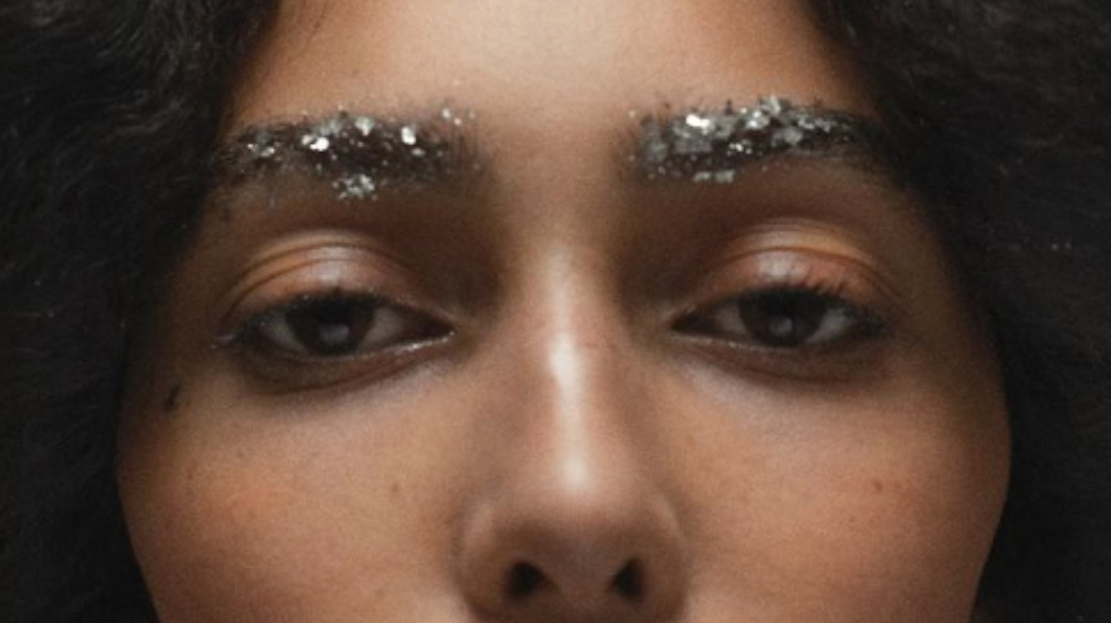 Yes, You Can Pull Off The Glitter Brow Trend. Here's How
