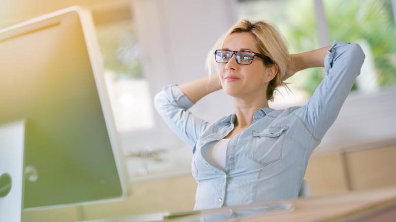 8 Exercises You Can Do While Sitting At Your Desk